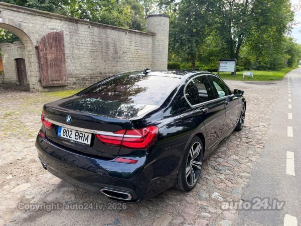 Black BMW 7 Series 2015 in Tallinn, with an engine capacity of 3.00 L and mileage of 254 thousand km for 21000 €, photo 6 on AUTOMOTO.COM.LV