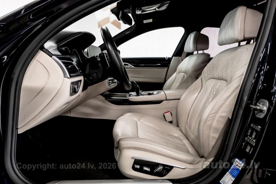 Black BMW 7 Series 2015 in Parnu, with an engine capacity of 3.00 L and mileage of 254 thousand km for 23490 €, photo 12 on AUTOMOTO.COM.LV