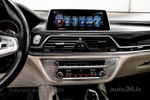 Black BMW 7 Series 2015 in Parnu, with an engine capacity of 3.00 L and mileage of 254 thousand km for 23490 €, photo 19 on AUTOMOTO.COM.LV