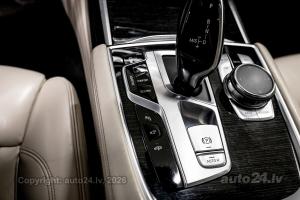 Black BMW 7 Series 2015 in Parnu, with an engine capacity of 3.00 L and mileage of 254 thousand km for 23490 €, photo 26 on AUTOMOTO.COM.LV