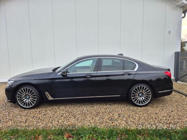 Black BMW 7 Series 2016 in Tartu, with an engine capacity of 3.00 L and mileage of 218 thousand km for 24800 €, photo 2 on AUTOMOTO.COM.LV