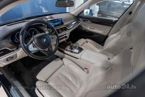 Black BMW 7 Series 2016 in Tallinn, with an engine capacity of 2.99 L and mileage of 120 thousand km for 32990 €, photo 6 on AUTOMOTO.COM.LV