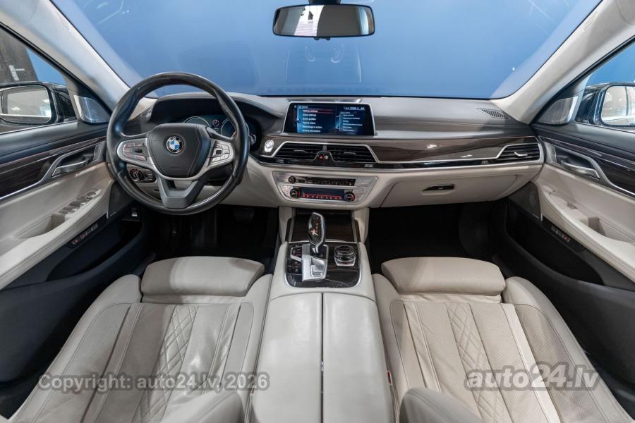 Black BMW 7 Series 2016 in Tallinn, with an engine capacity of 2.99 L and mileage of 120 thousand km for 32990 €, photo 7 on AUTOMOTO.COM.LV
