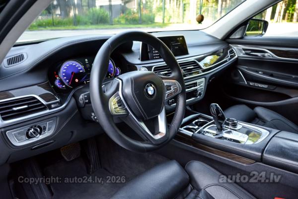 Black BMW 7 Series 2016 in Tallinn, with an engine capacity of 3.00 L and mileage of 228 thousand km for 29500 €, photo 9 on AUTOMOTO.COM.LV