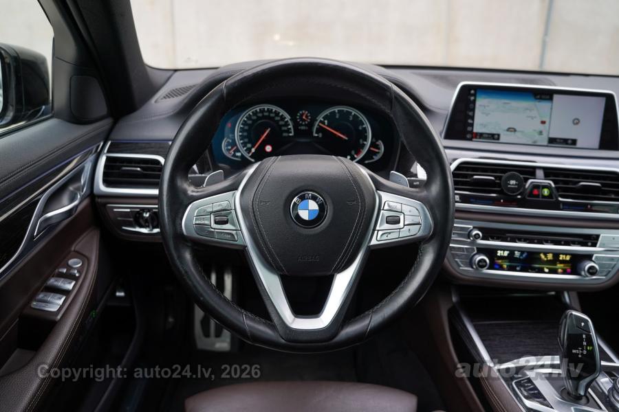 Black BMW 7 Series 2017 in Tallinn, with an engine capacity of 3.00 L and mileage of 130 thousand km for 30900 €, photo 12 on AUTOMOTO.COM.LV