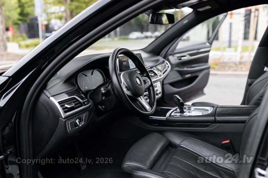 Black BMW 7 Series 2017 in Tallinn, with an engine capacity of 3.00 L and mileage of 214 thousand km for 25999 €, photo 9 on AUTOMOTO.COM.LV