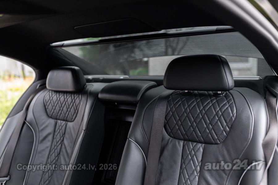 Black BMW 7 Series 2017 in Tallinn, with an engine capacity of 3.00 L and mileage of 214 thousand km for 25999 €, photo 13 on AUTOMOTO.COM.LV