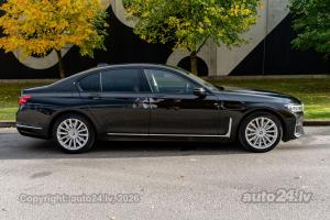 Black BMW 7 Series 2022 in Tallinn, with an engine capacity of 3.00 L and mileage of 59 thousand km for 59400 €, photo 6 on AUTOMOTO.COM.LV