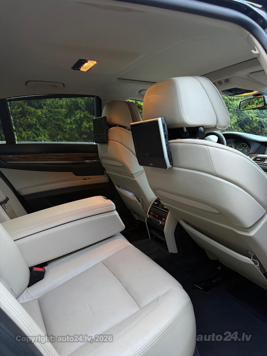 Blue BMW 7 Series 2011 in Tallinn, with an engine capacity of 3.00 L and mileage of 295 thousand km for 11999 €, photo 11 on AUTOMOTO.COM.LV