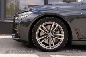 Grey BMW 7 Series 2015 in Tallinn, with an engine capacity of 4.40 L and mileage of 179 thousand km for 24900 €, photo 6 on AUTOMOTO.COM.LV