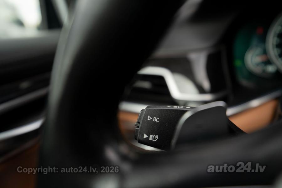 Grey BMW 7 Series 2015 in Tallinn, with an engine capacity of 4.40 L and mileage of 179 thousand km for 24900 €, photo 21 on AUTOMOTO.COM.LV