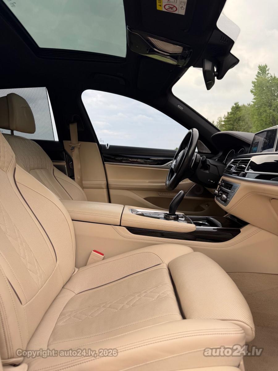 Grey BMW 7 Series 2018 in Tallinn, with an engine capacity of 3.00 L and mileage of 158 thousand km for 33900 €, photo 19 on AUTOMOTO.COM.LV