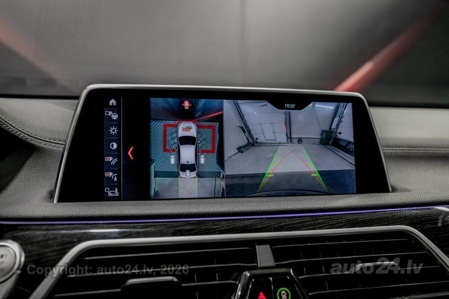 Grey BMW 7 Series 2018 in Parnu, with an engine capacity of 3.00 L and mileage of 180 thousand km for 25900 €, photo 27 on AUTOMOTO.COM.LV
