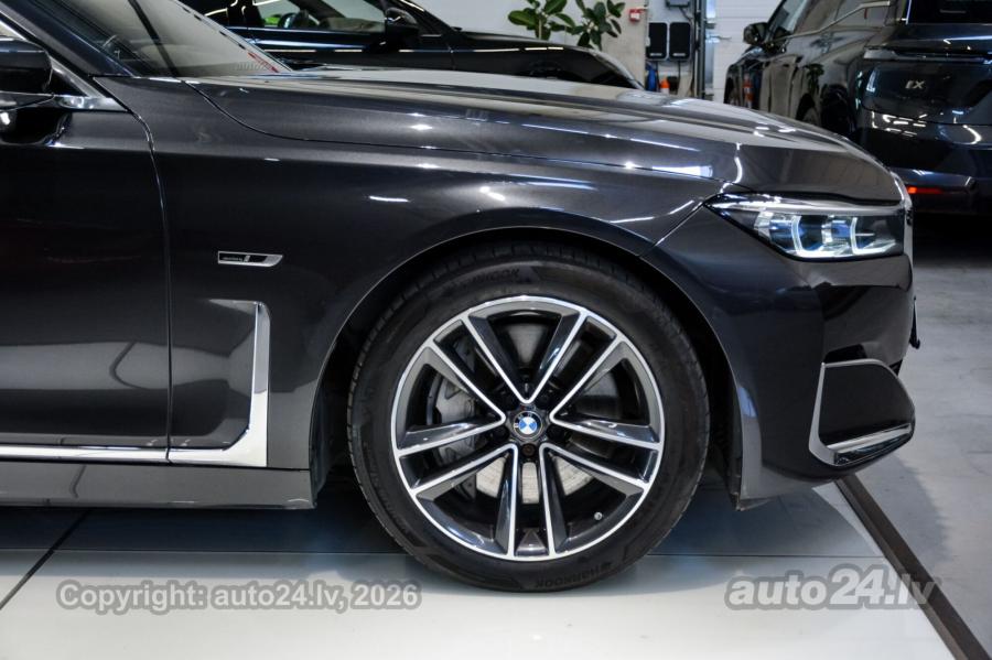 Grey BMW 7 Series 2022 in Tallinn, with an engine capacity of 3.00 L and mileage of 159 thousand km for 47900 €, photo 8 on AUTOMOTO.COM.LV
