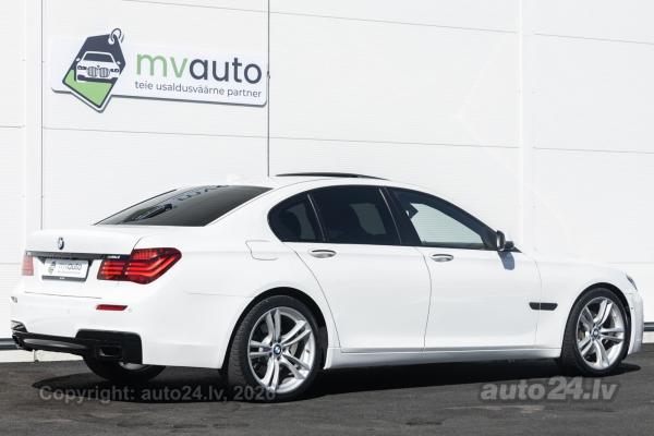 White BMW 7 Series 2013 in Tallinn, with an engine capacity of 3.00 L and mileage of 292 thousand km for 15990 €, photo 2 on AUTOMOTO.COM.LV