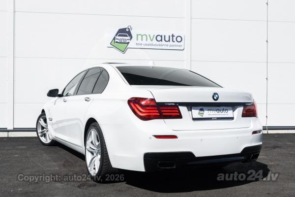White BMW 7 Series 2013 in Tallinn, with an engine capacity of 3.00 L and mileage of 292 thousand km for 15990 €, photo 6 on AUTOMOTO.COM.LV