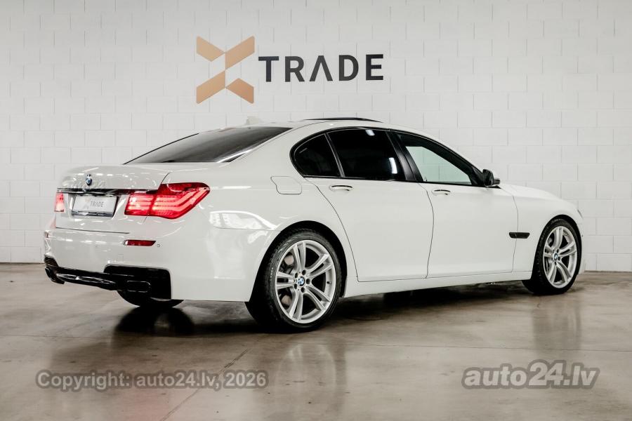 White BMW 7 Series 2013 in Parnu, with an engine capacity of 3.00 L and mileage of 294 thousand km for 14990 €, photo 3 on AUTOMOTO.COM.LV