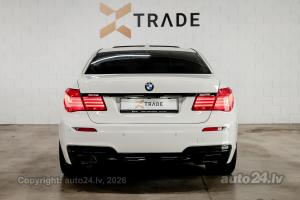White BMW 7 Series 2013 in Parnu, with an engine capacity of 3.00 L and mileage of 294 thousand km for 14990 €, photo 5 on AUTOMOTO.COM.LV