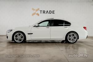 White BMW 7 Series 2013 in Parnu, with an engine capacity of 3.00 L and mileage of 294 thousand km for 14990 €, photo 6 on AUTOMOTO.COM.LV