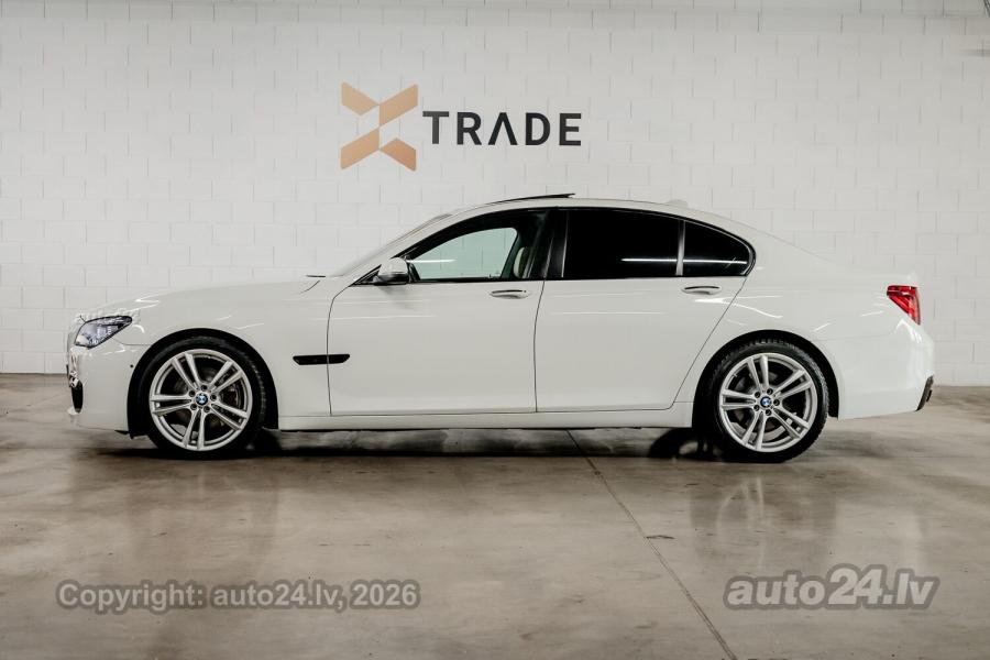 White BMW 7 Series 2013 in Parnu, with an engine capacity of 3.00 L and mileage of 294 thousand km for 14990 €, photo 6 on AUTOMOTO.COM.LV