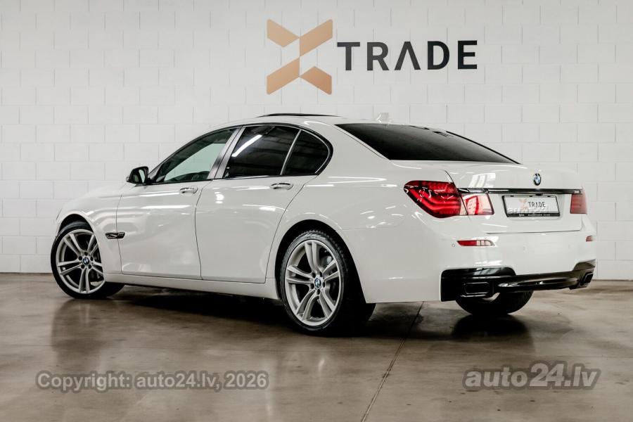 White BMW 7 Series 2013 in Parnu, with an engine capacity of 3.00 L and mileage of 294 thousand km for 14990 €, photo 8 on AUTOMOTO.COM.LV