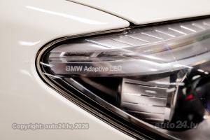 White BMW 7 Series 2013 in Parnu, with an engine capacity of 3.00 L and mileage of 294 thousand km for 14990 €, photo 9 on AUTOMOTO.COM.LV