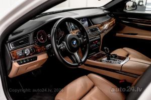 White BMW 7 Series 2013 in Parnu, with an engine capacity of 3.00 L and mileage of 294 thousand km for 14990 €, photo 10 on AUTOMOTO.COM.LV