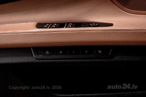 White BMW 7 Series 2013 in Parnu, with an engine capacity of 3.00 L and mileage of 294 thousand km for 14990 €, photo 25 on AUTOMOTO.COM.LV
