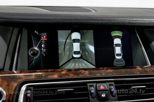 White BMW 7 Series 2013 in Parnu, with an engine capacity of 3.00 L and mileage of 294 thousand km for 14990 €, photo 27 on AUTOMOTO.COM.LV