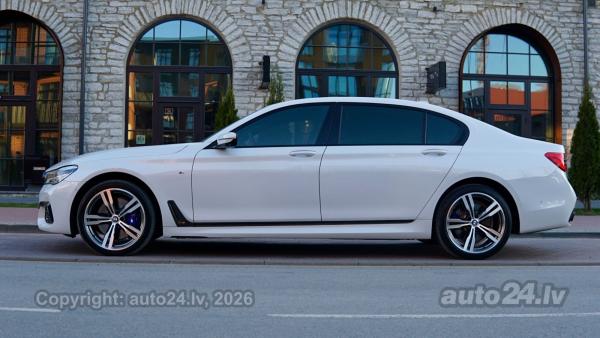 White BMW 7 Series 2016 in Tallinn, with an engine capacity of 4.40 L and mileage of 180 thousand km for 32700 €, photo 6 on AUTOMOTO.COM.LV