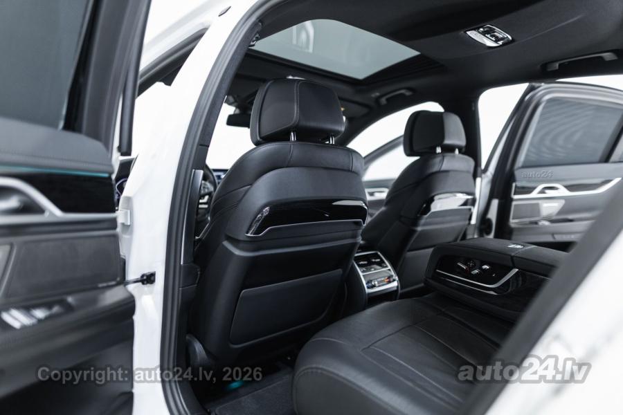 White BMW 7 Series 2020 in Tallinn, with an engine capacity of 3.00 L and mileage of 112 thousand km for 50990 €, photo 19 on AUTOMOTO.COM.LV