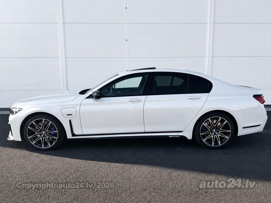 White BMW 7 Series 2021 in Tallinn, with an engine capacity of 3.00 L and mileage of 108 thousand km for 41500 €, photo 4 on AUTOMOTO.COM.LV