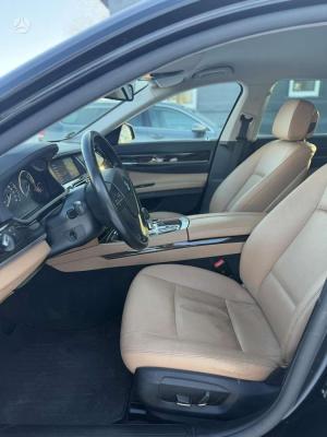 Black BMW 730 2014 in Vilnius, with an engine capacity of 3.00 L and mileage of 298 thousand km for 8800 €, photo 3 on AUTOMOTO.COM.LV