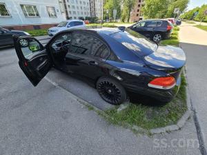Black BMW 730 2004 in Riga, with an engine capacity of 3.00 L and mileage of 216 thousand km for 2250 €, photo 8 on AUTOMOTO.COM.LV