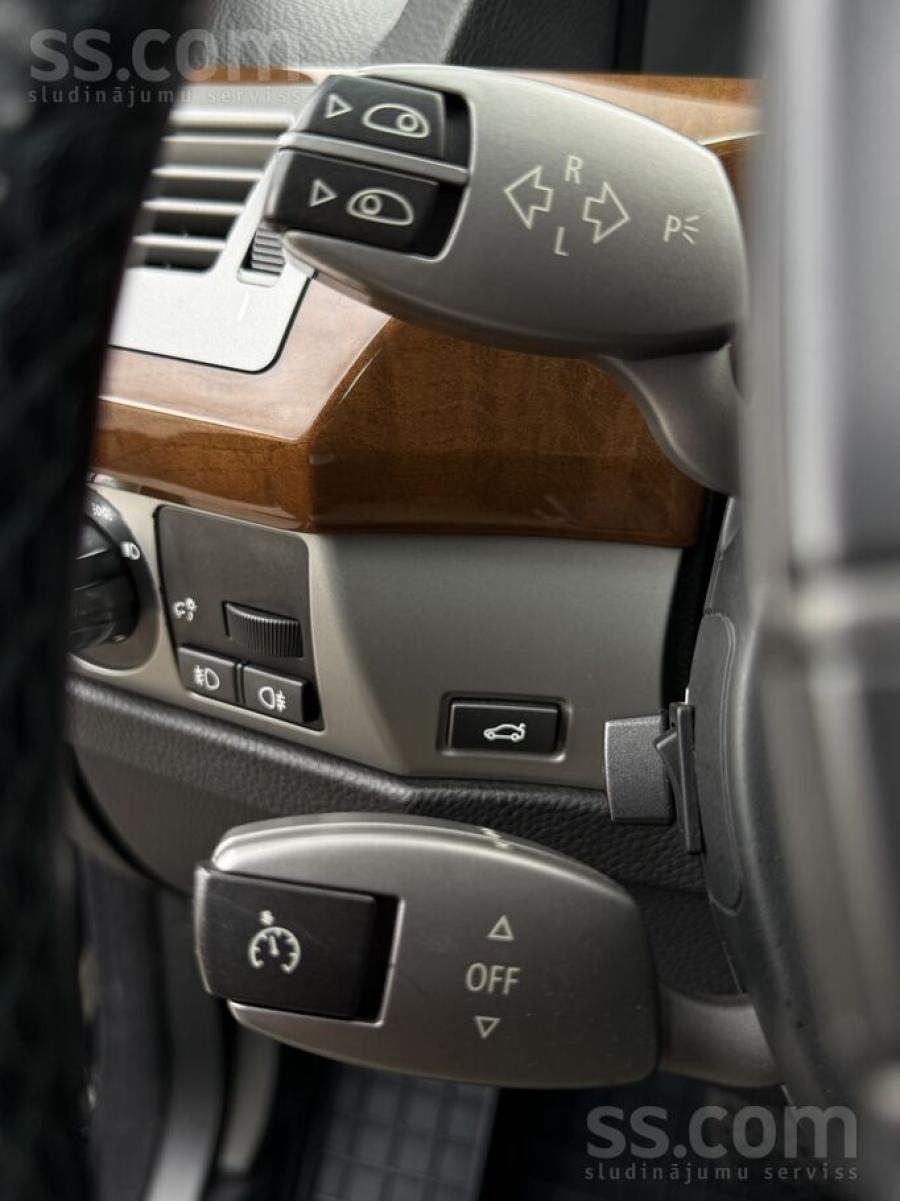 Black BMW 730 2006 in Kuldiga, with an engine capacity of 3.00 L and mileage of 290 thousand km for 6250 €, photo 12 on AUTOMOTO.COM.LV