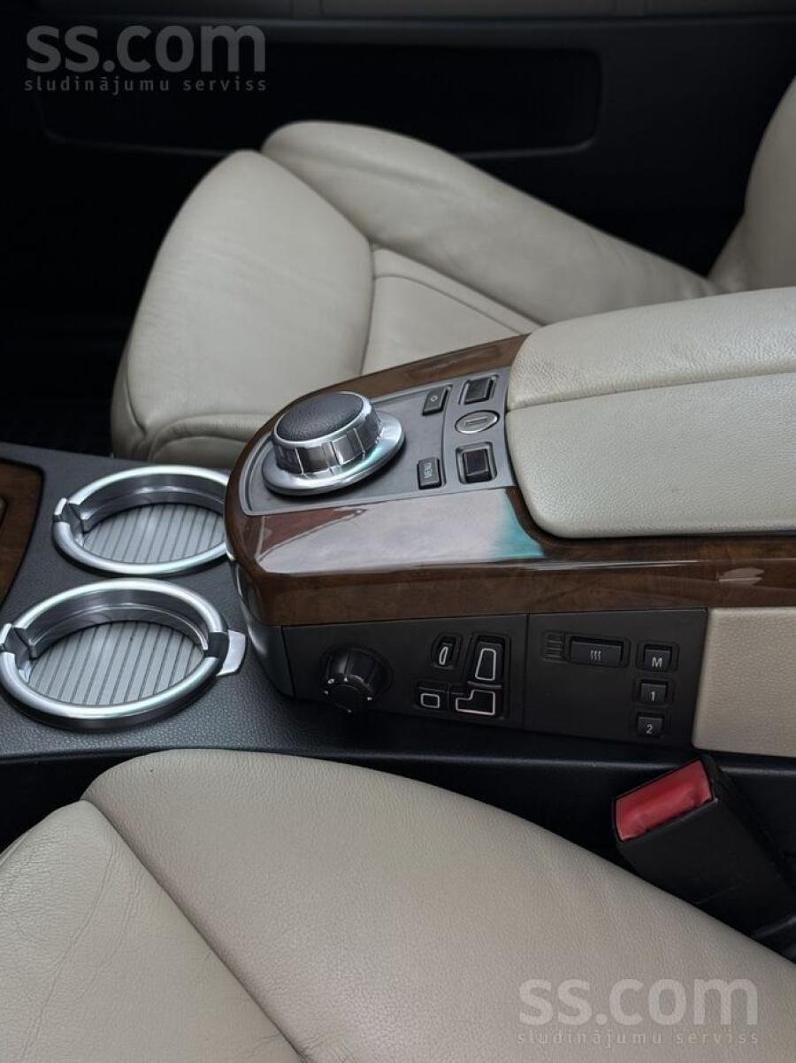 Black BMW 730 2006 in Kuldiga, with an engine capacity of 3.00 L and mileage of 290 thousand km for 6250 €, photo 13 on AUTOMOTO.COM.LV