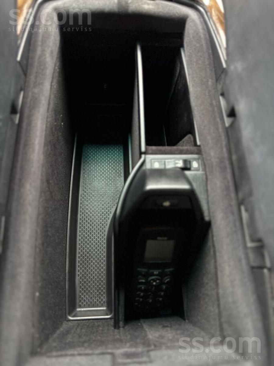 Black BMW 730 2006 in Kuldiga, with an engine capacity of 3.00 L and mileage of 290 thousand km for 6250 €, photo 31 on AUTOMOTO.COM.LV