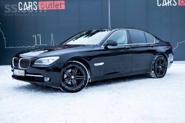Black BMW 730 2009 in Riga, with an engine capacity of 3.00 L and mileage of 372 thousand km for 9990 €, photo 1 on AUTOMOTO.COM.LV