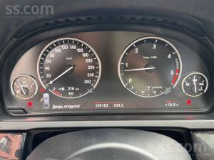 Black BMW 730 2009 in Riga, with an engine capacity of 3.00 L and mileage of 239 thousand km for 11495 €, photo 16 on AUTOMOTO.COM.LV