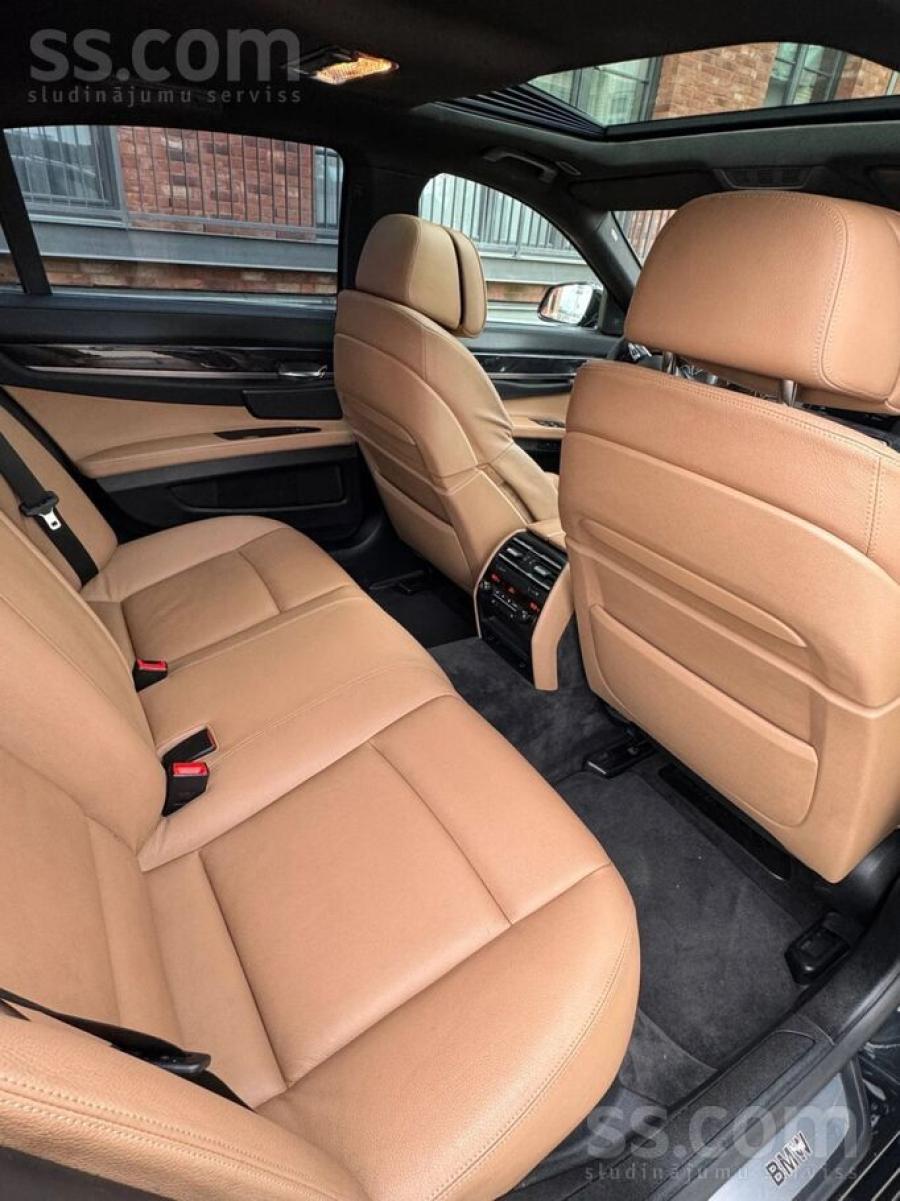 Black BMW 730 2009 in Riga, with an engine capacity of 3.00 L and mileage of 239 thousand km for 11495 €, photo 18 on AUTOMOTO.COM.LV