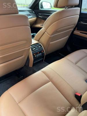 Black BMW 730 2009 in Riga, with an engine capacity of 3.00 L and mileage of 239 thousand km for 11495 €, photo 19 on AUTOMOTO.COM.LV