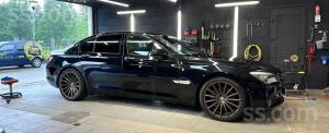 Black BMW 730 2009 in Riga, with an engine capacity of 3.00 L and mileage of 239 thousand km for 11495 €, photo 20 on AUTOMOTO.COM.LV