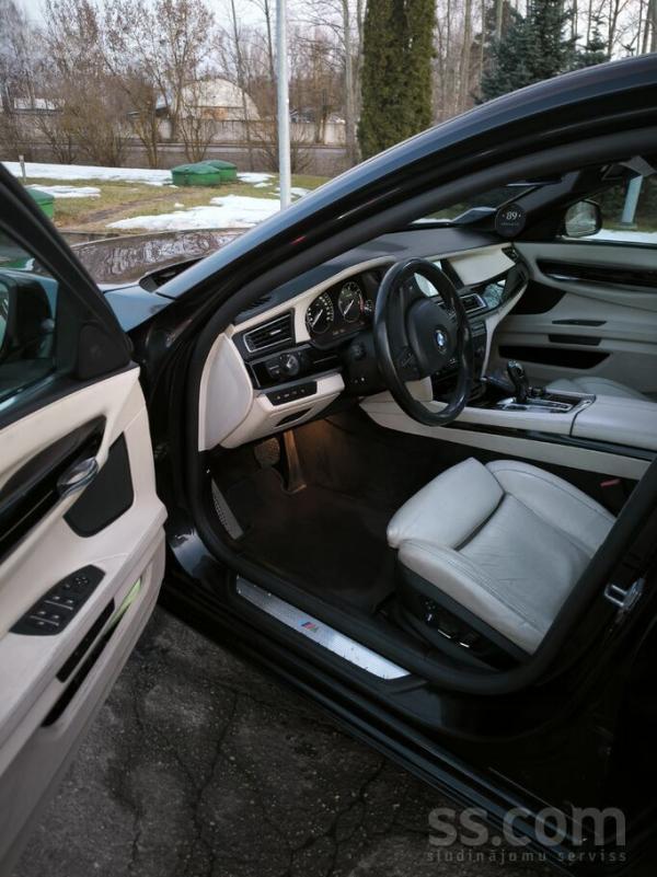 Black BMW 730 2009 in Riga, with an engine capacity of 3.00 L and mileage of 338 thousand km for 11490 €, photo 9 on AUTOMOTO.COM.LV