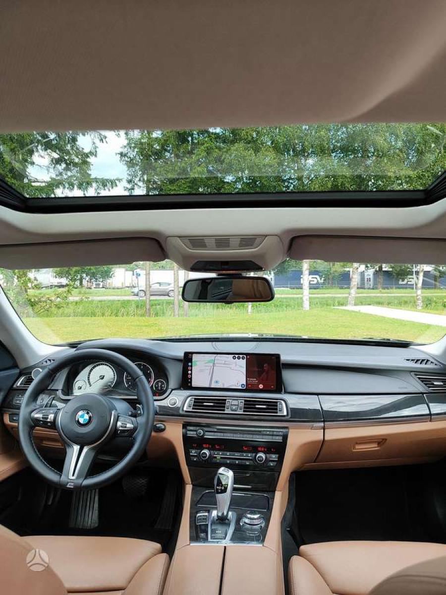 Black BMW 730 2009 in Vilnius, with an engine capacity of 3.00 L and mileage of 301 thousand km for 9650 €, photo 9 on AUTOMOTO.COM.LV