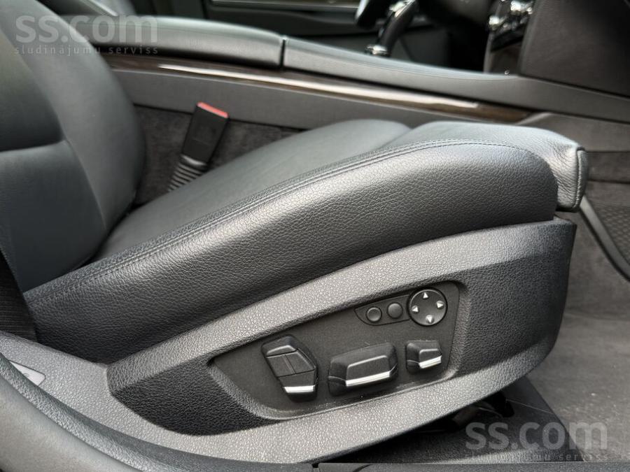 Black BMW 730 2009 in Riga, with an engine capacity of 3.00 L and mileage of 336 thousand km for 9900 €, photo 10 on AUTOMOTO.COM.LV