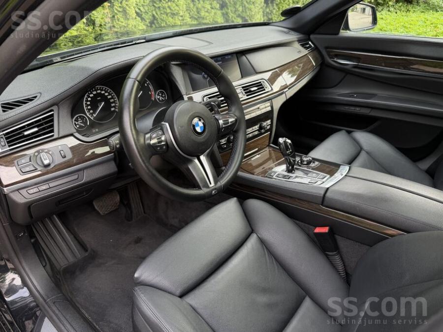 Black BMW 730 2009 in Riga, with an engine capacity of 3.00 L and mileage of 336 thousand km for 9900 €, photo 14 on AUTOMOTO.COM.LV