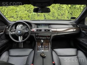 Black BMW 730 2009 in Riga, with an engine capacity of 3.00 L and mileage of 336 thousand km for 9900 €, photo 19 on AUTOMOTO.COM.LV