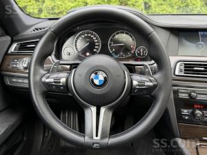 Black BMW 730 2009 in Riga, with an engine capacity of 3.00 L and mileage of 336 thousand km for 9900 €, photo 21 on AUTOMOTO.COM.LV