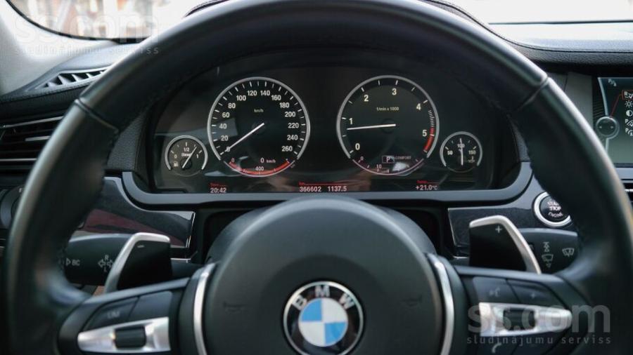 Black BMW 730 2009 in Riga, with an engine capacity of 3.00 L and mileage of 367 thousand km for 10500 €, photo 11 on AUTOMOTO.COM.LV