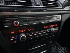 Black BMW 730 2009 in Liepaja, with an engine capacity of 3.00 L and mileage of 271 thousand km for 8750 €, photo 13 on AUTOMOTO.COM.LV